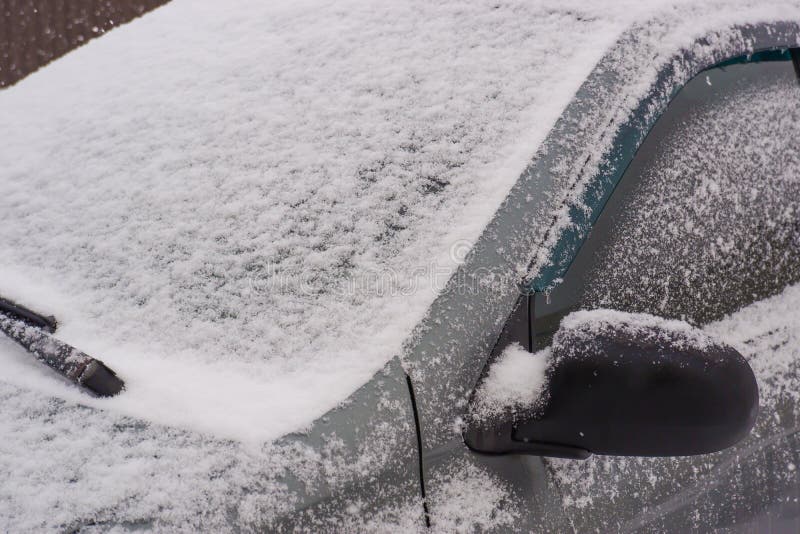 Car in the Snow after a Night Snowfall in Spring. Changing of the ...