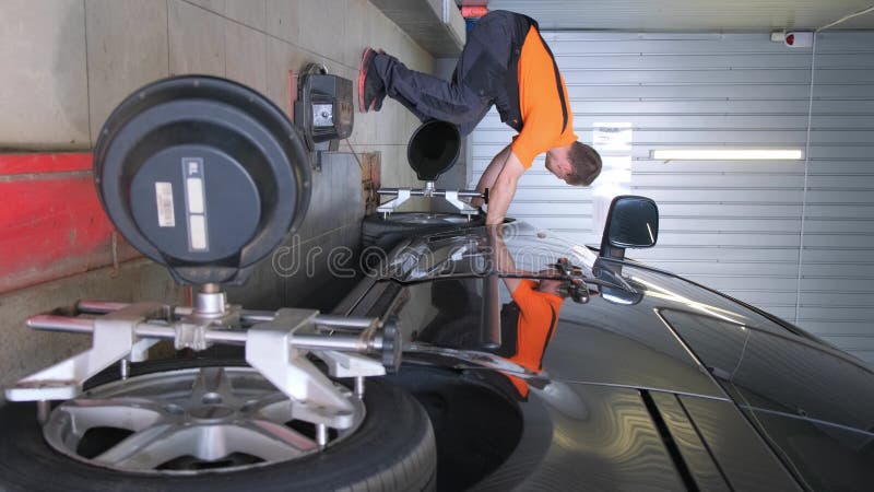 The Car is Standing on a Stand for Adjusting Car Wheels in a Car ...
