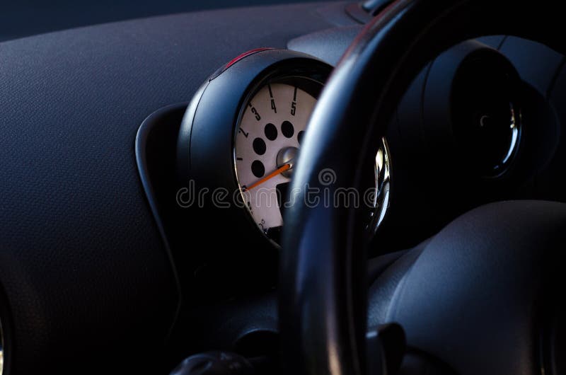 Car Steering Wheel and Tachometer Stock Photo - Image of arrow, pointer ...