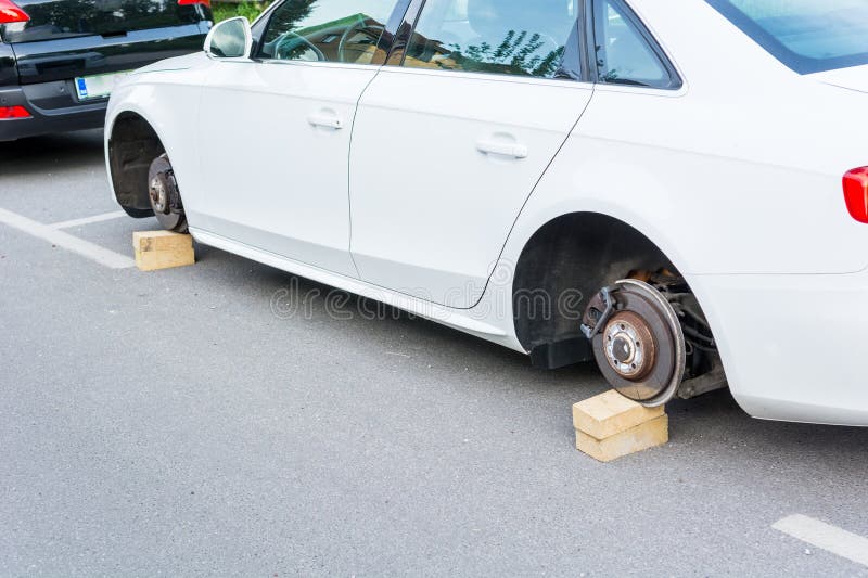Car with stolen wheels stock image. Image of alloys, vandals - 54006345