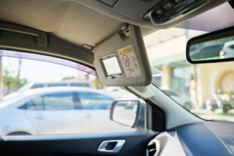 Car Sun Visor with Airbag Warning and Mirror Stock Photo - Image of ...