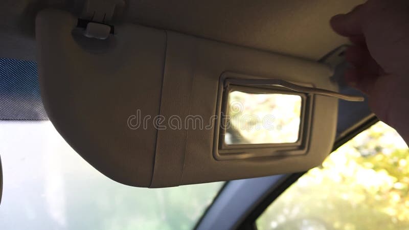 Car sun visor with mirror stock video. Video of mode - 351978243