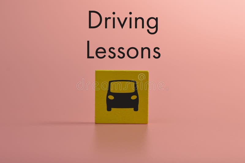 Car Symbol on Wooden Block with Text DRIVING LESSONS Stock Image ...