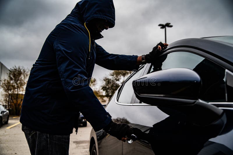 Car Theft Break in Broad Daylight Stock Photo - Image of robbery, auto ...