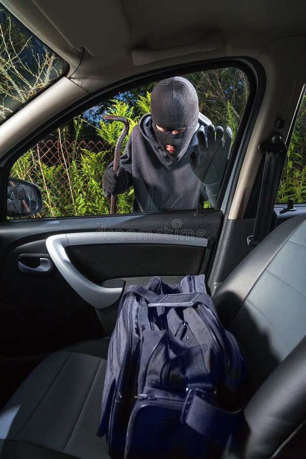 Car thief in a mask stock photo. Image of problems, robber - 83793798