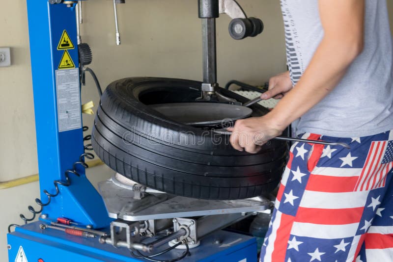 Car tire change Tires stock image. Image of rubber, indoors - 88492127