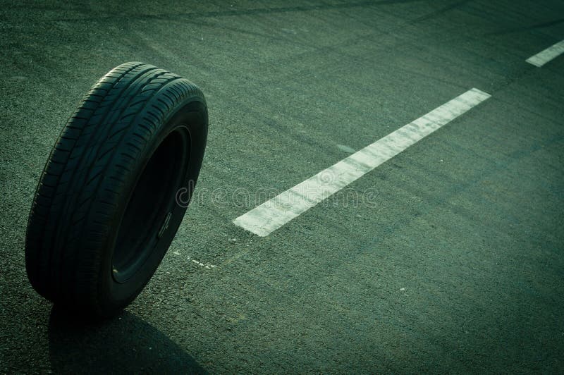 Car tire on the road stock photo. Image of transport - 23621574