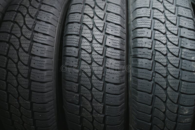 Car Tire Shop Concept , New Car Tire and Tire Stacked on Sideways ...