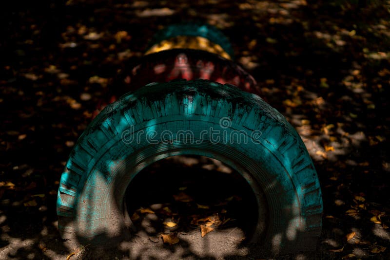Car Tires in the Earth of Different Colors Stock Photo - Image of ideas ...
