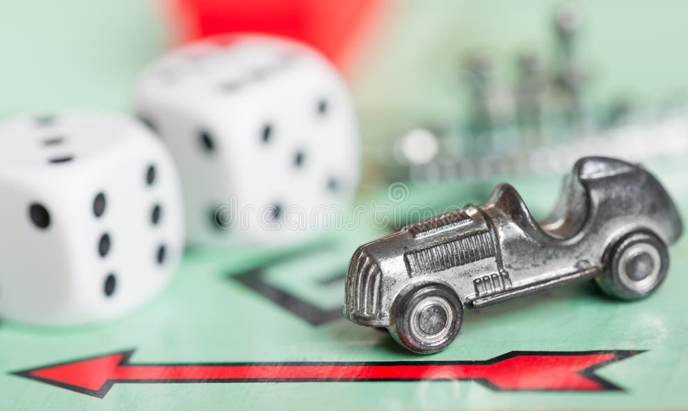 Car Token on a Monopoly Game Board Editorial Stock Image - Image of ...
