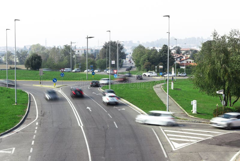 Road Traffic at Roundabout Junction Stock Photo - Image of vehicle ...