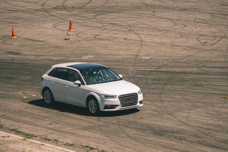Car and Traffic Cones, Driving School Concept. Training Car Performs ...