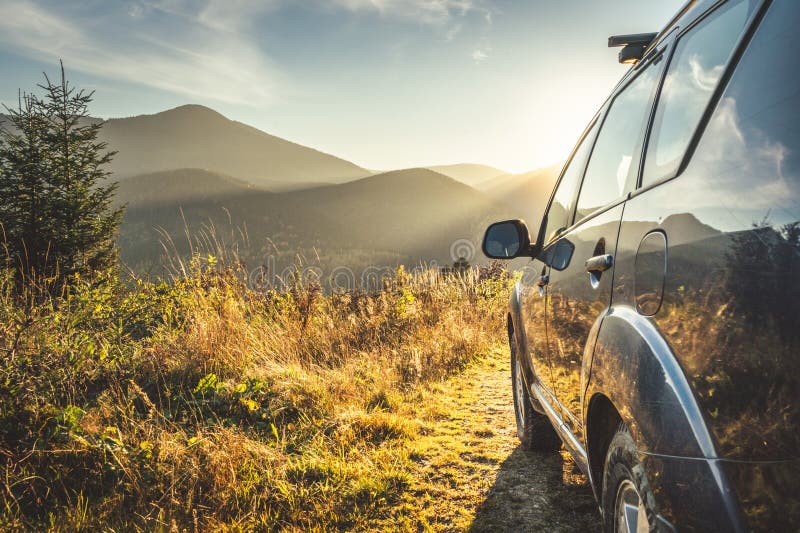 Car for Traveling with a Mountain Road Stock Photo - Image of rack ...