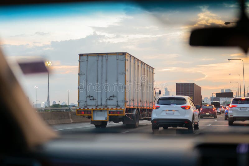 Car and Trucks in Traffic Jam on Highway in Rush Hour. Stock Image ...