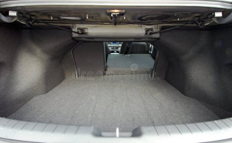 Car Trunk with Rear Seats Folded of the Sedan Stock Photo - Image of ...