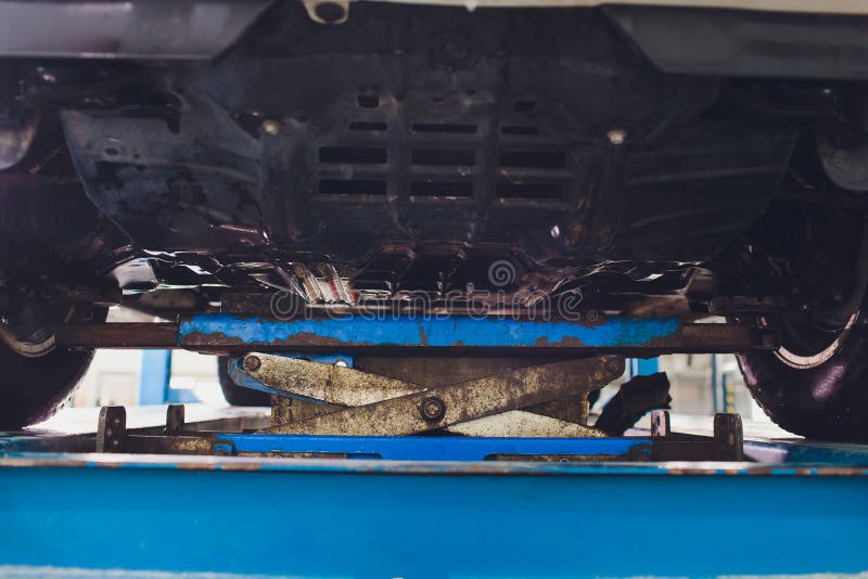 Car on Two-post Elevator in Workshop Service Station. Stock Image ...