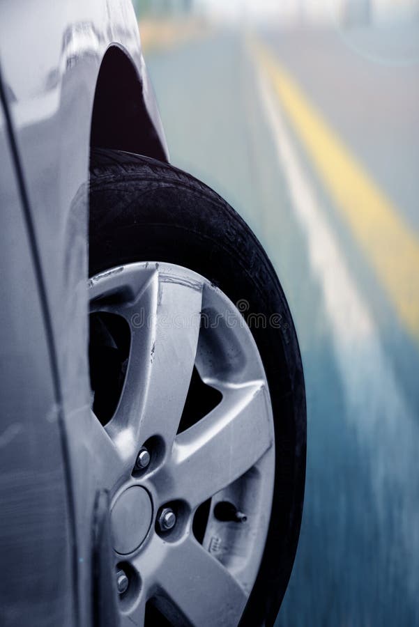 Car Tyre Side View on the Road, Automobile Backdrop Stock Photo - Image ...