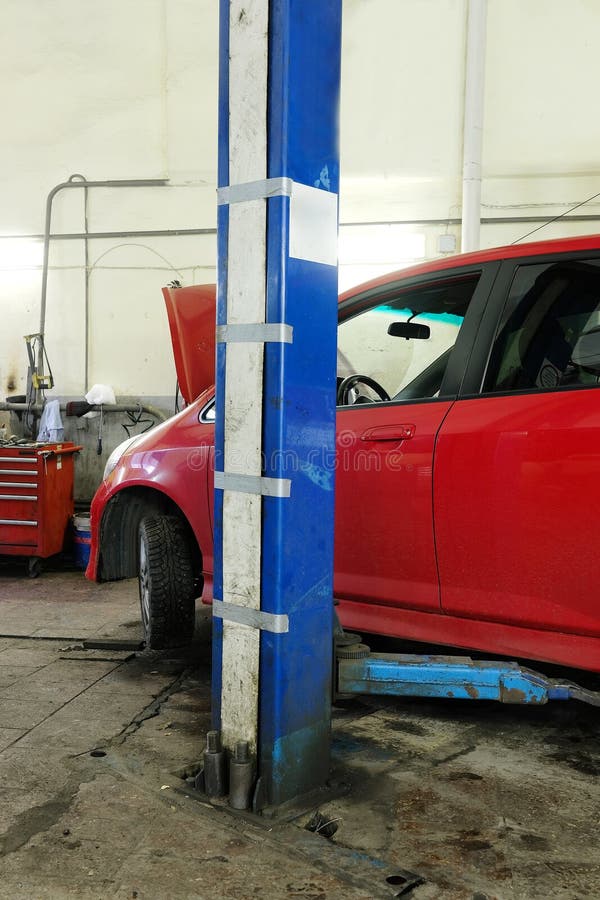 Car under repair stock photo. Image of lift, maintenance - 80156010