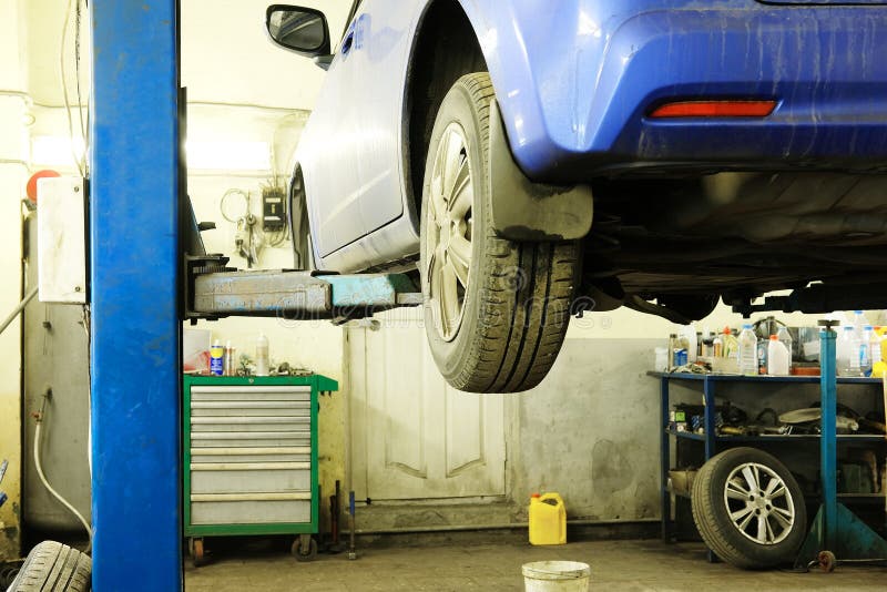 Car under repair stock image. Image of disassemble, wheel - 12037823