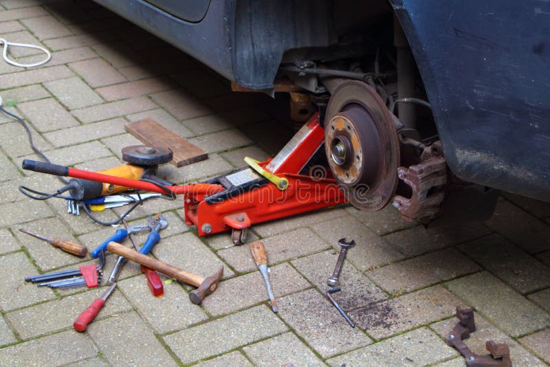 Car under repair stock photo. Image of safety, disc, metal - 89770456