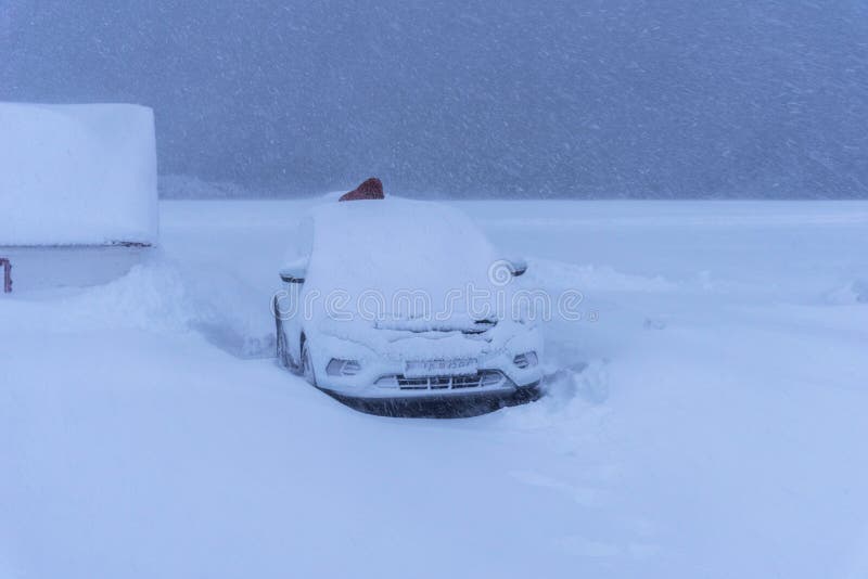 Car Under the Snow during Heavy Snowfall Stock Photo - Image of snow ...