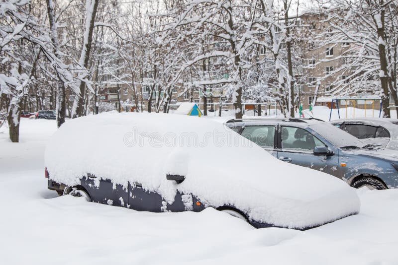 Car Under Snow on a Parking Stock Image - Image of snowfall, winter ...