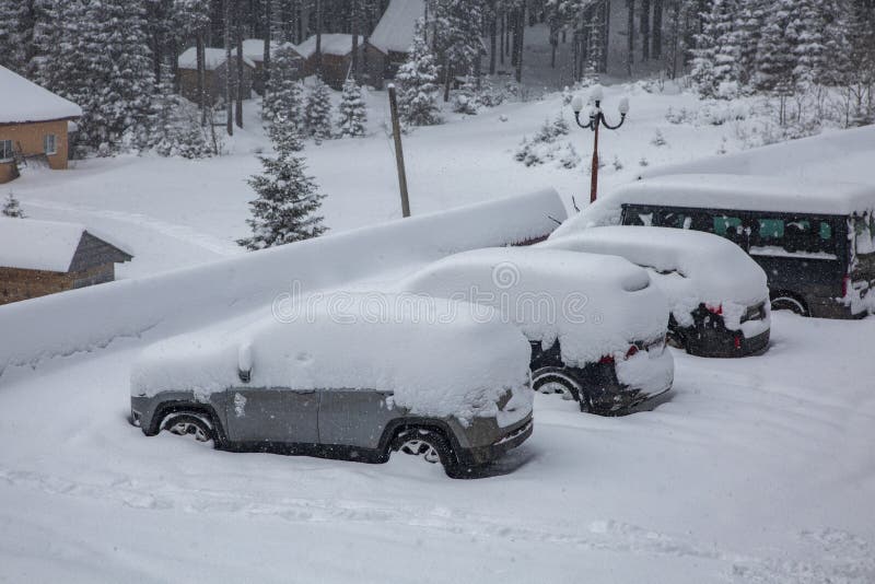 Car Under a Thick Layer of Snow. Snow-covered Cars during a Winter ...