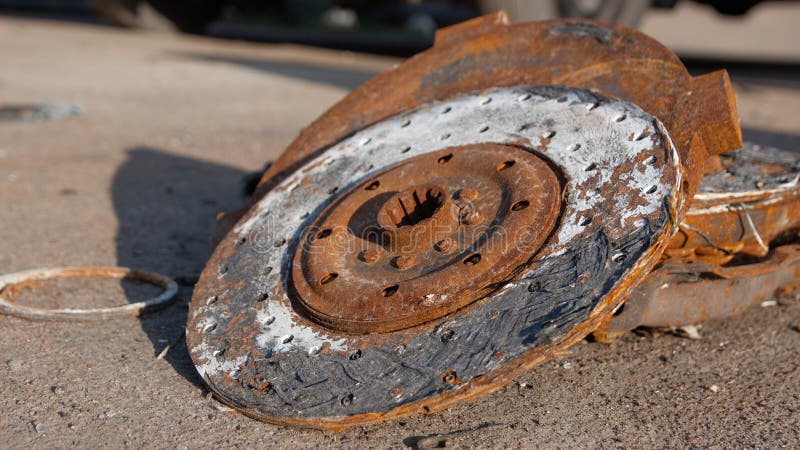 Car Vaccination Disk. Car Spare Parts after a Fire Stock Photo - Image ...