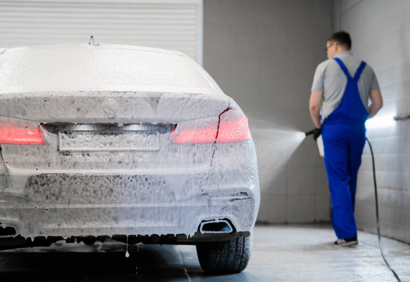 Car Washing Process. Foaming Detergent Covers Side of the Car, Clean it ...
