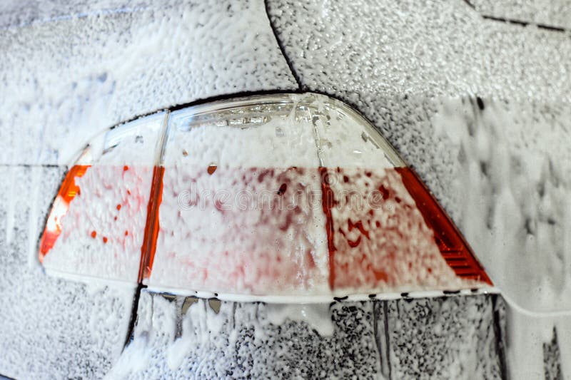 Car Washing Process. Foaming Detergent Covers Side of the Car, Clean it ...
