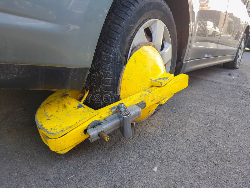 Car Wheel Blocked by Wheel Lock/clamp in Montreal, Canada Stock Photo ...