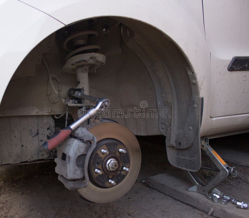 Car Wheel on Car Repair Station. Stock Image - Image of screws, correct ...