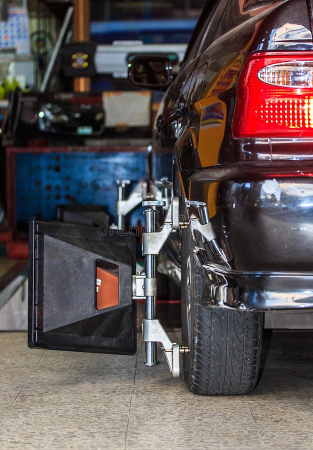 Car wheel fixing stock image. Image of aligning, bearings - 37216645
