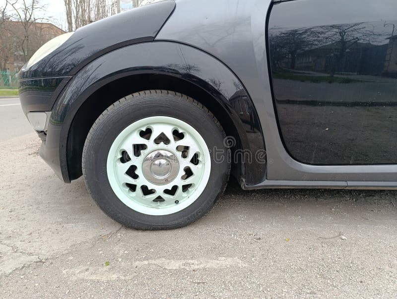 Car Wheel with Heart-shaped Hubcaps Stock Photo - Image of motor ...