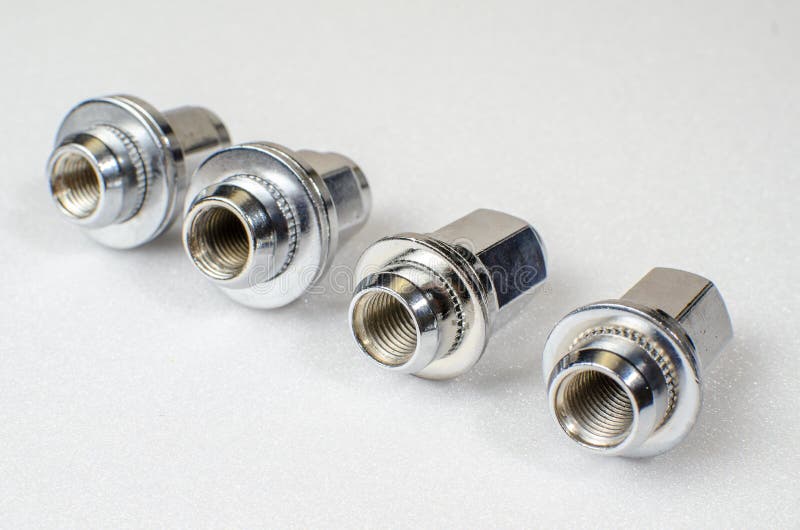 Car Wheel Nuts on a White Background Stock Image - Image of close ...