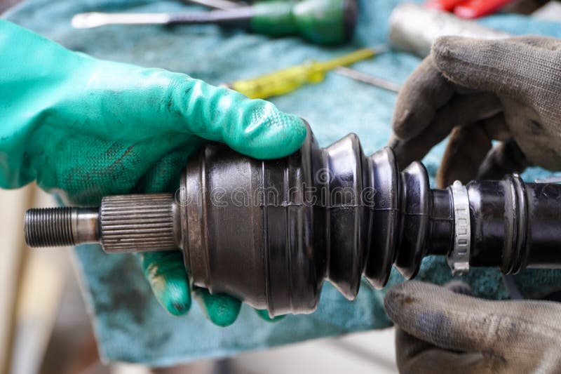 Car Wheel Shaft Mechanic Has Checked and Repaired,Macpherson Suspension ...