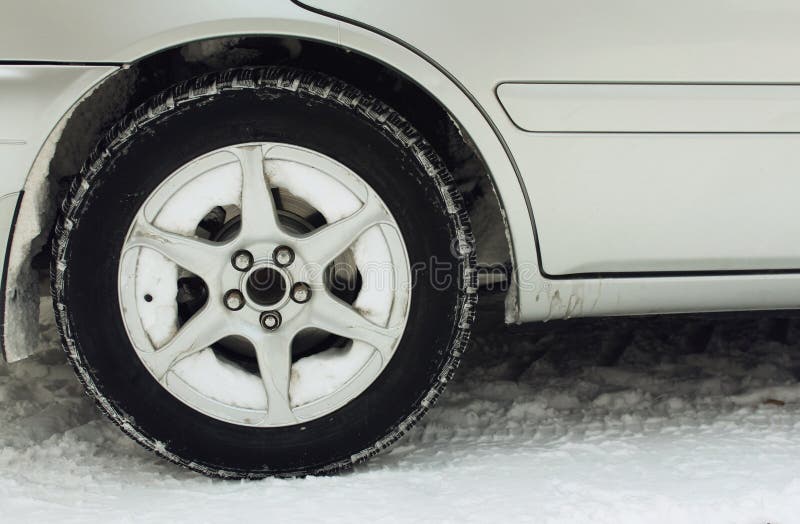 The car wheel in the snow stock image. Image of life - 83434195