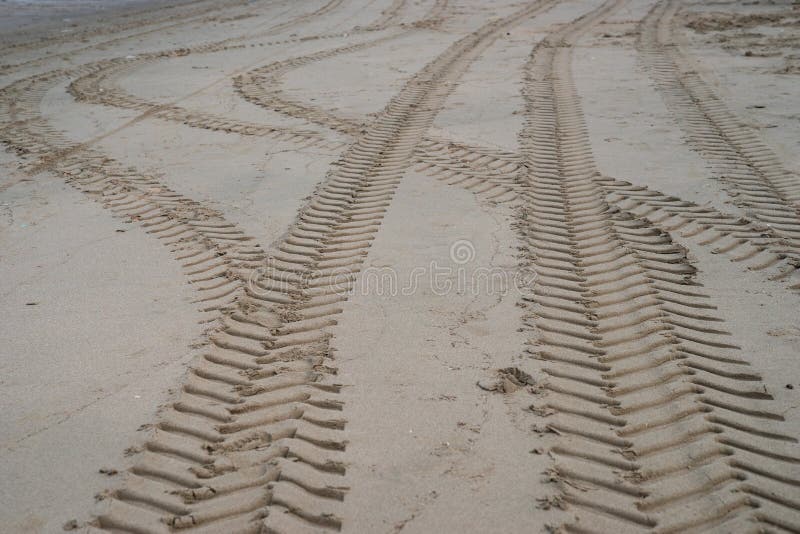 Car Wheel Tracks on Beach Sand Stock Photo - Image of imprint, ripple ...