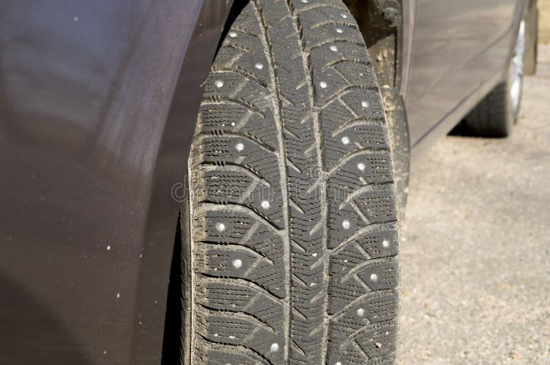 Car Wheel with Winter Tread Pattern and Spikes Stock Photo - Image of ...