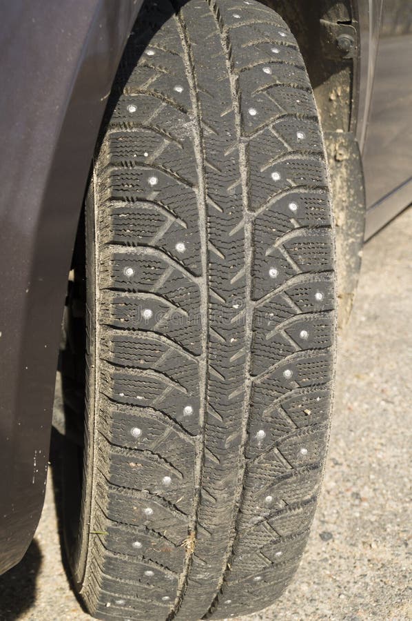 Car Wheel with Winter Tread Pattern and Spikes Stock Image - Image of ...