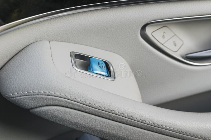 Car White Leather Interior Details of Door Handle with Windows Controls ...