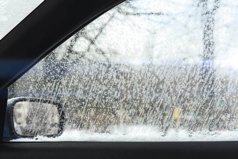 A Car Window Glass Under the Frozen Ice, Cold Winter Problems Concept ...