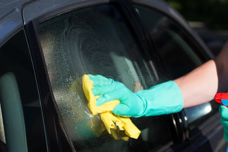 Male Hand with Tool for Washing Windows, Car Wash Stock Photo - Image ...