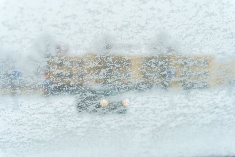 Car Windshield Covered in Snow with Out of Focus Background Stock Image ...
