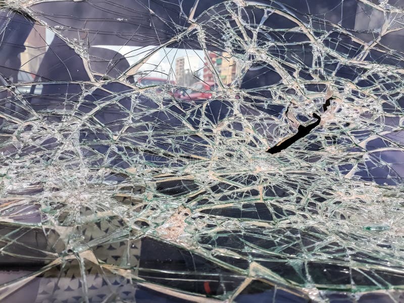 Car Windshield Shattered with Stones by Vandals Stock Photo - Image of ...