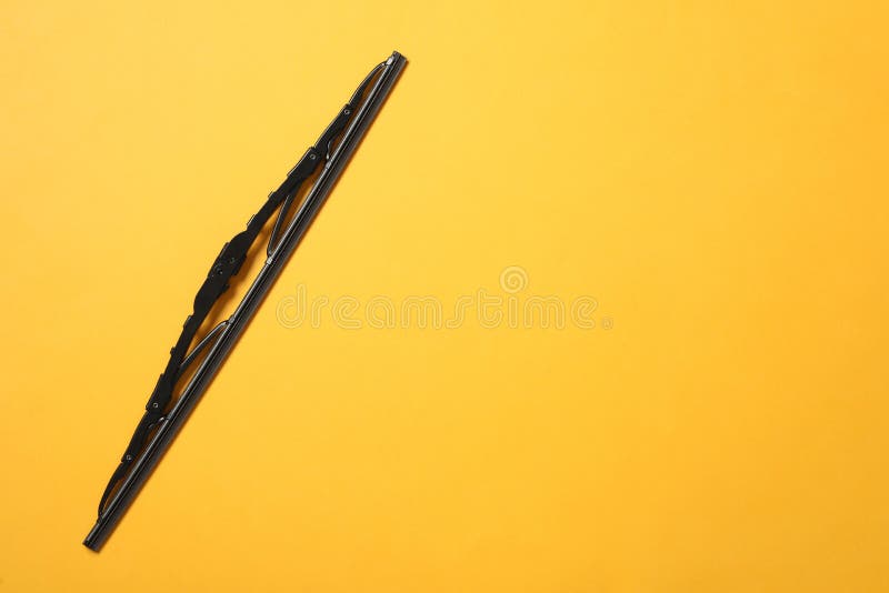 Car Windshield Wiper on Yellow Background, Top View. Space for Text ...