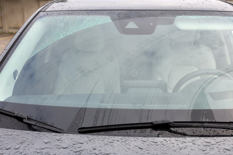 Car Wipers Cleaning Water Drops from Windshield Glass Outdoors, Closeup ...