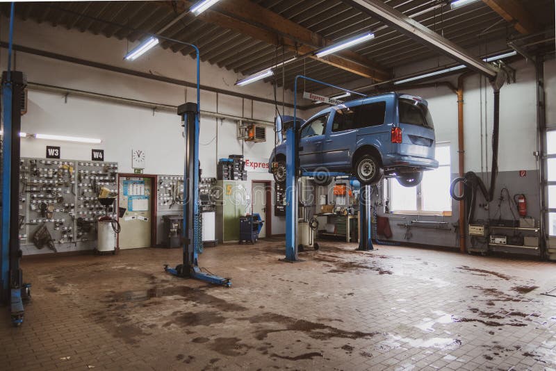In Car Workshop There are Lifting Platforms for Repairing Cars Stock ...