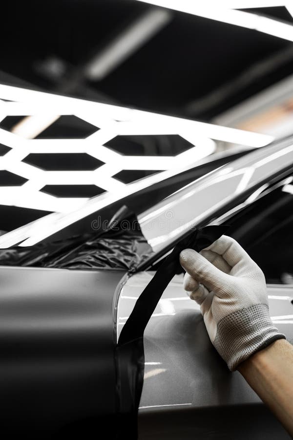 Car Wrap Application Changes Vehicle Appearance. Full Panel Car Vinyl ...