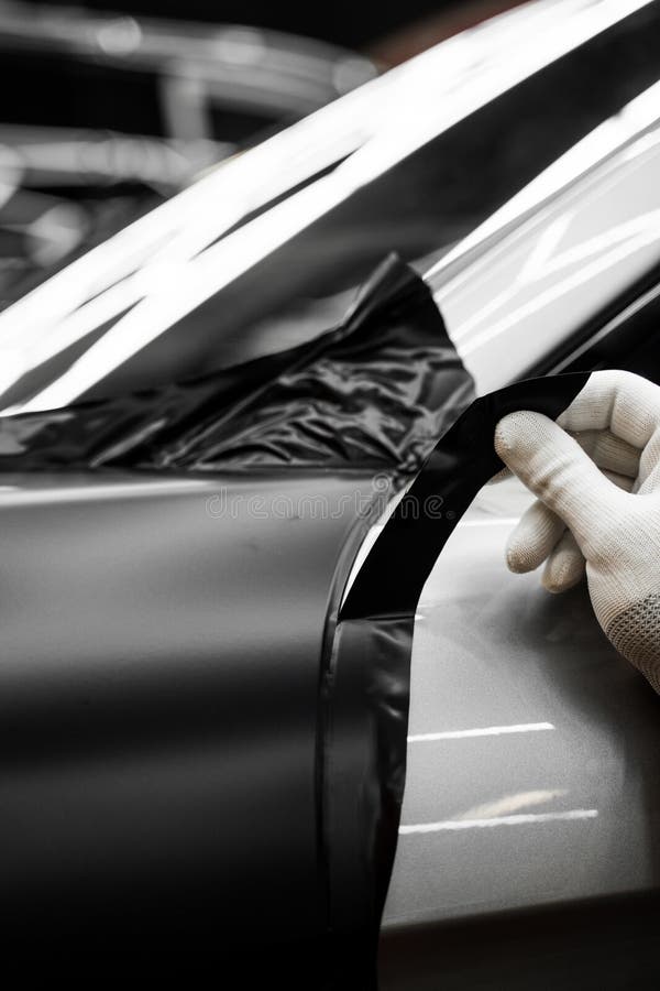 Car Wrap Application Changes Vehicle Appearance. Full Panel Car Vinyl ...